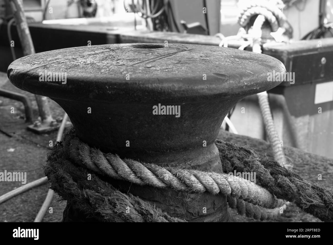 Large iron grappling hooks and thick ropes ropes on the boardwalks ...