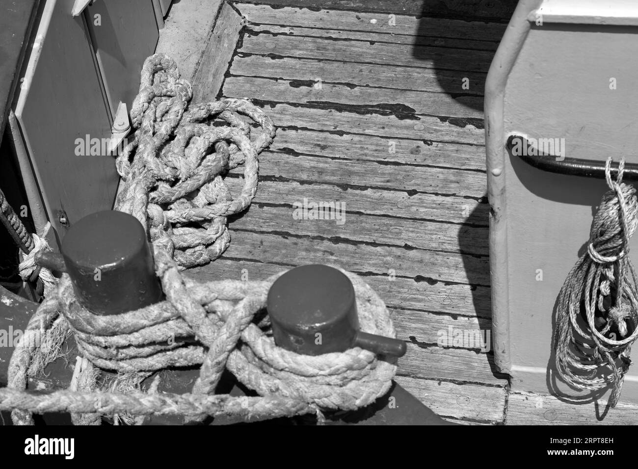 Large iron grappling hooks and thick ropes ropes on the boardwalks ...