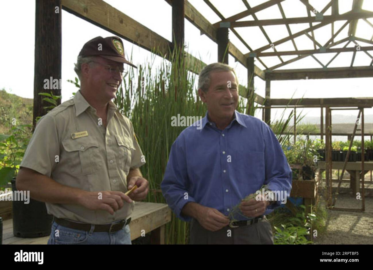 President George Bush, right, receiving briefing from Ralph Waycott ...