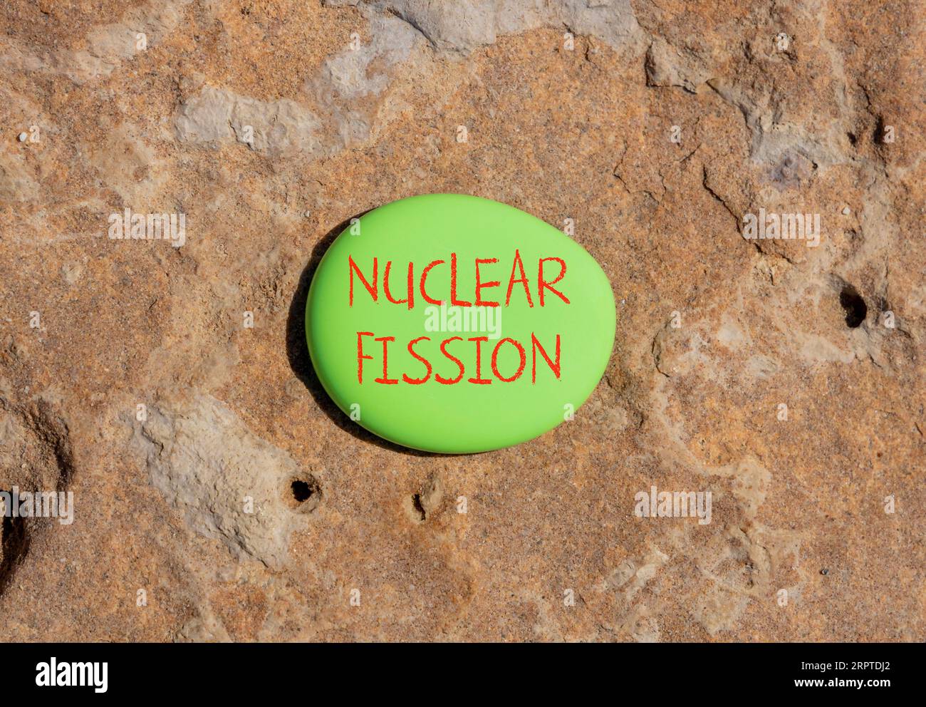 Nuclear fission symbol. Concept words Nuclear fission on beautiful big ...