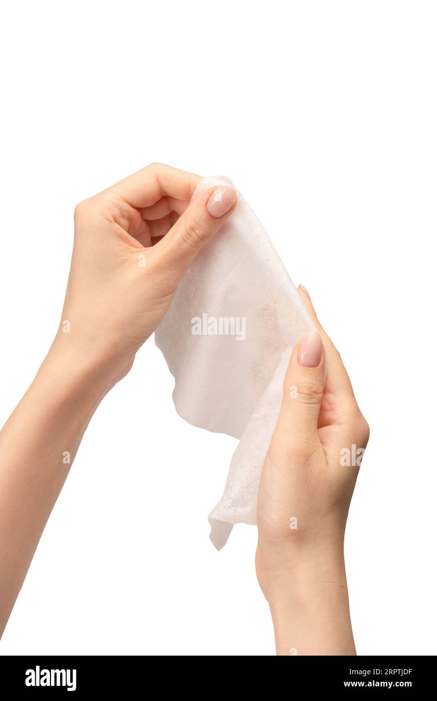 Wet wipe in a woman hand isolated on a white background. Washing hands ...