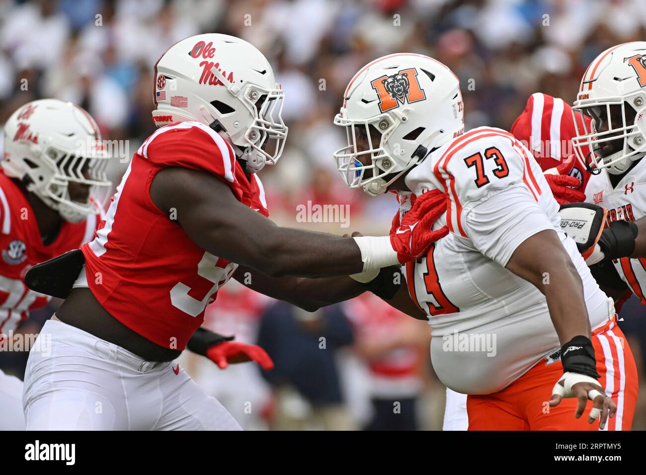 Mississippi defensive end Isaac Ukwu (99) blocks Mercer offensive ...