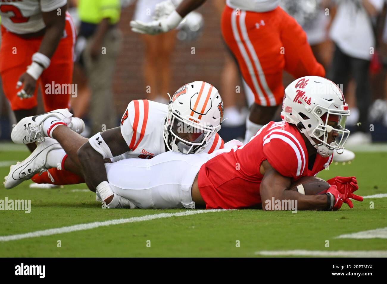 Mississippi wide receiver Tre Harris (9) dives for a touchdown past ...