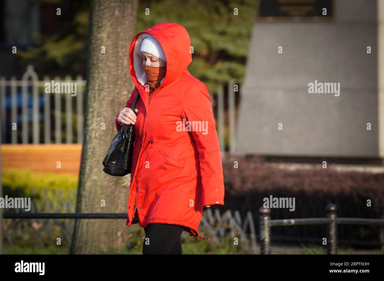 200417 -- WARSAW, April 17, 2020 -- A woman is seen wearing a face mask ...