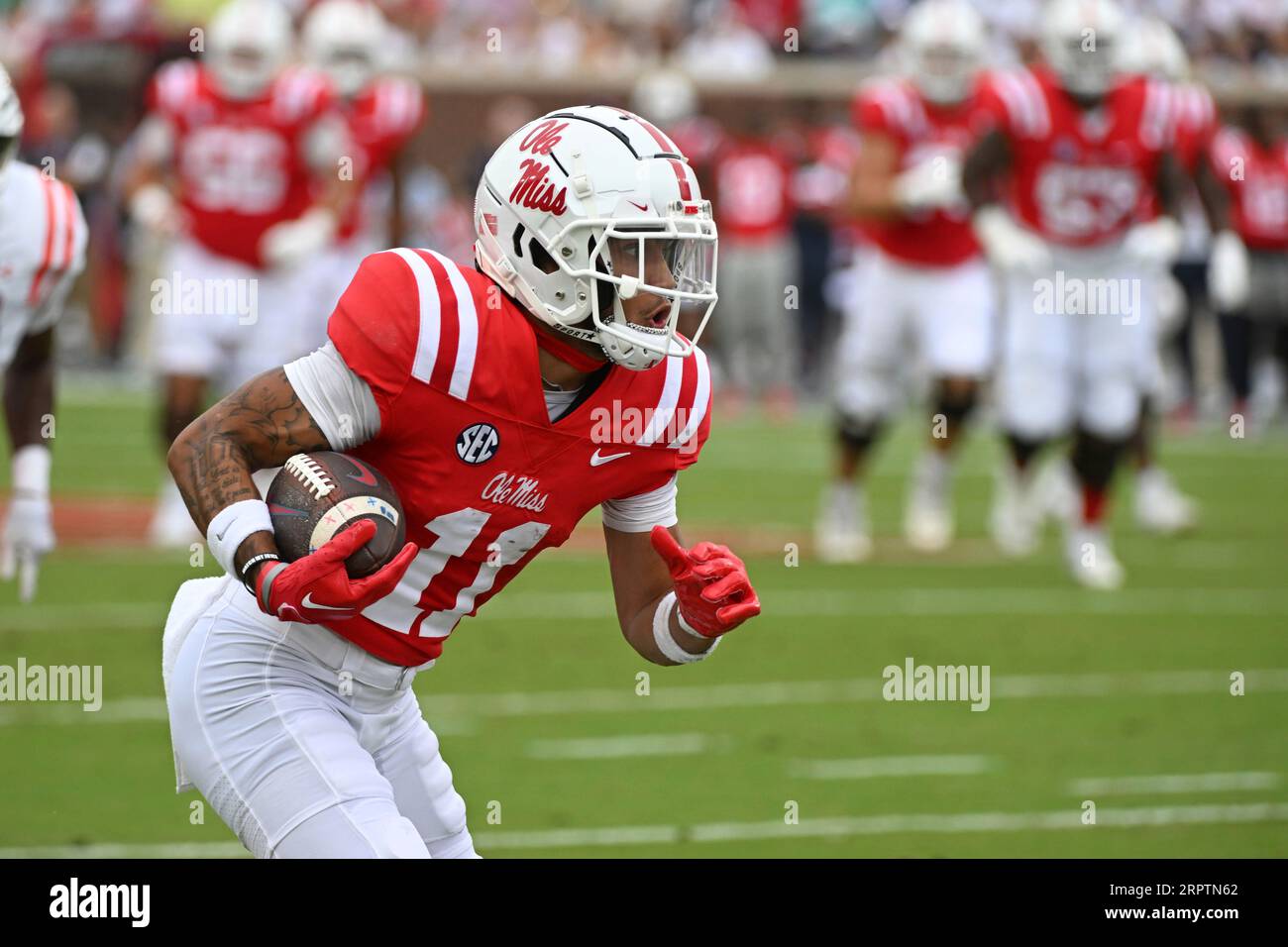 Mississippi wide receiver Jordan Watkins (11) runs with the ball after ...