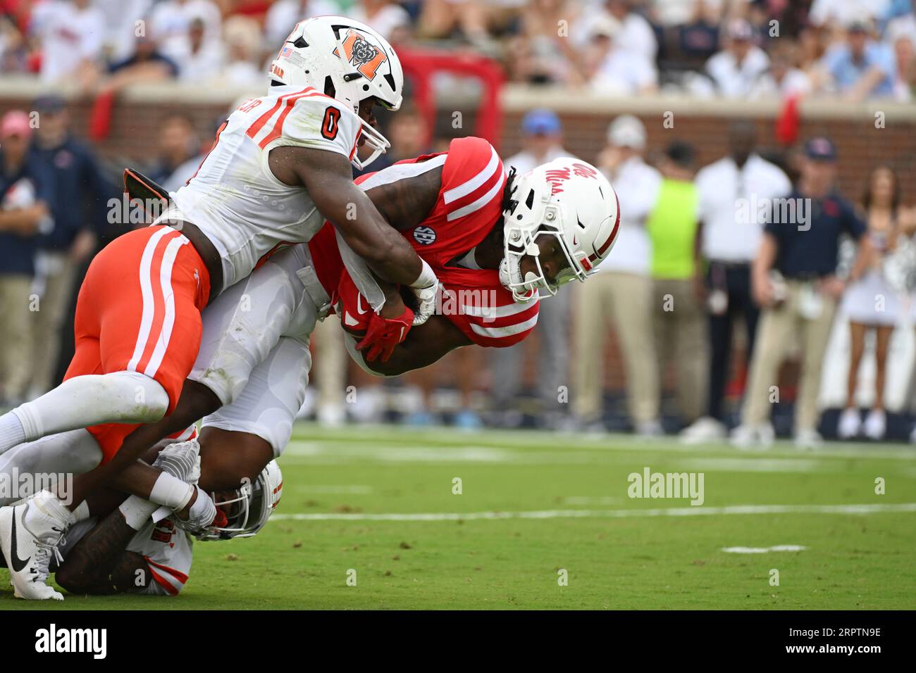 Mercer safeties Myles Redding (2) and Lance Wise (0) tackle Mississippi ...