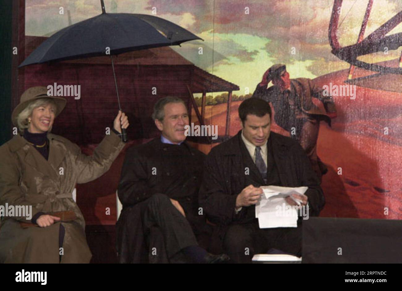 Secretary Gale Norton, President George Bush, and actor John Travolta ...