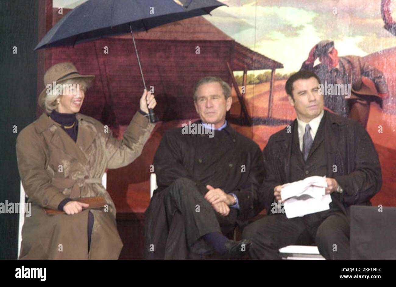 Secretary Gale Norton, President George Bush, and actor John Travolta ...