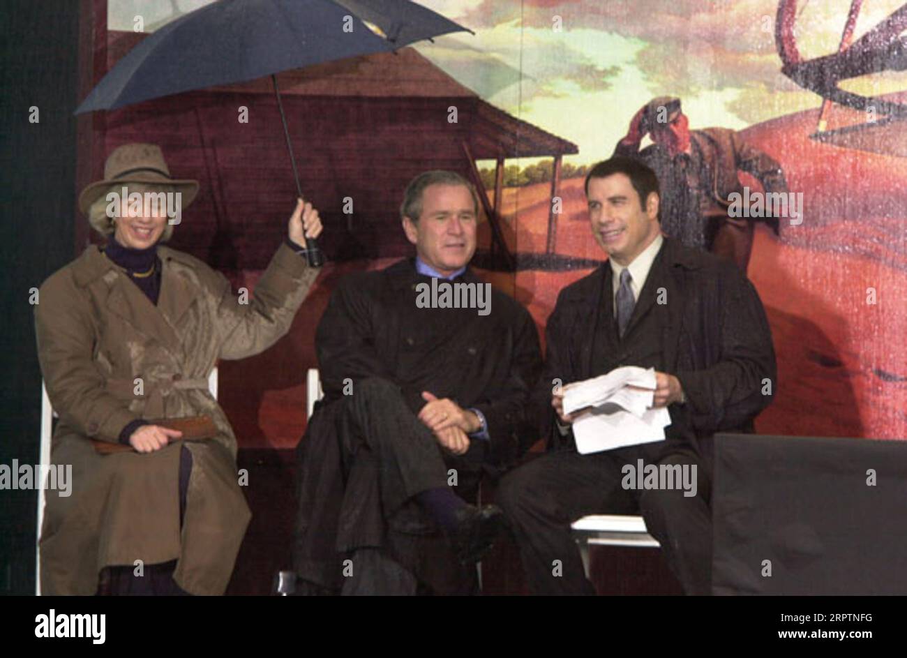 Secretary Gale Norton, President George Bush, and actor John Travolta ...