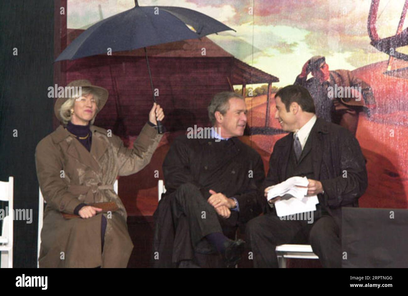 Secretary Gale Norton, President George Bush, and actor John Travolta ...