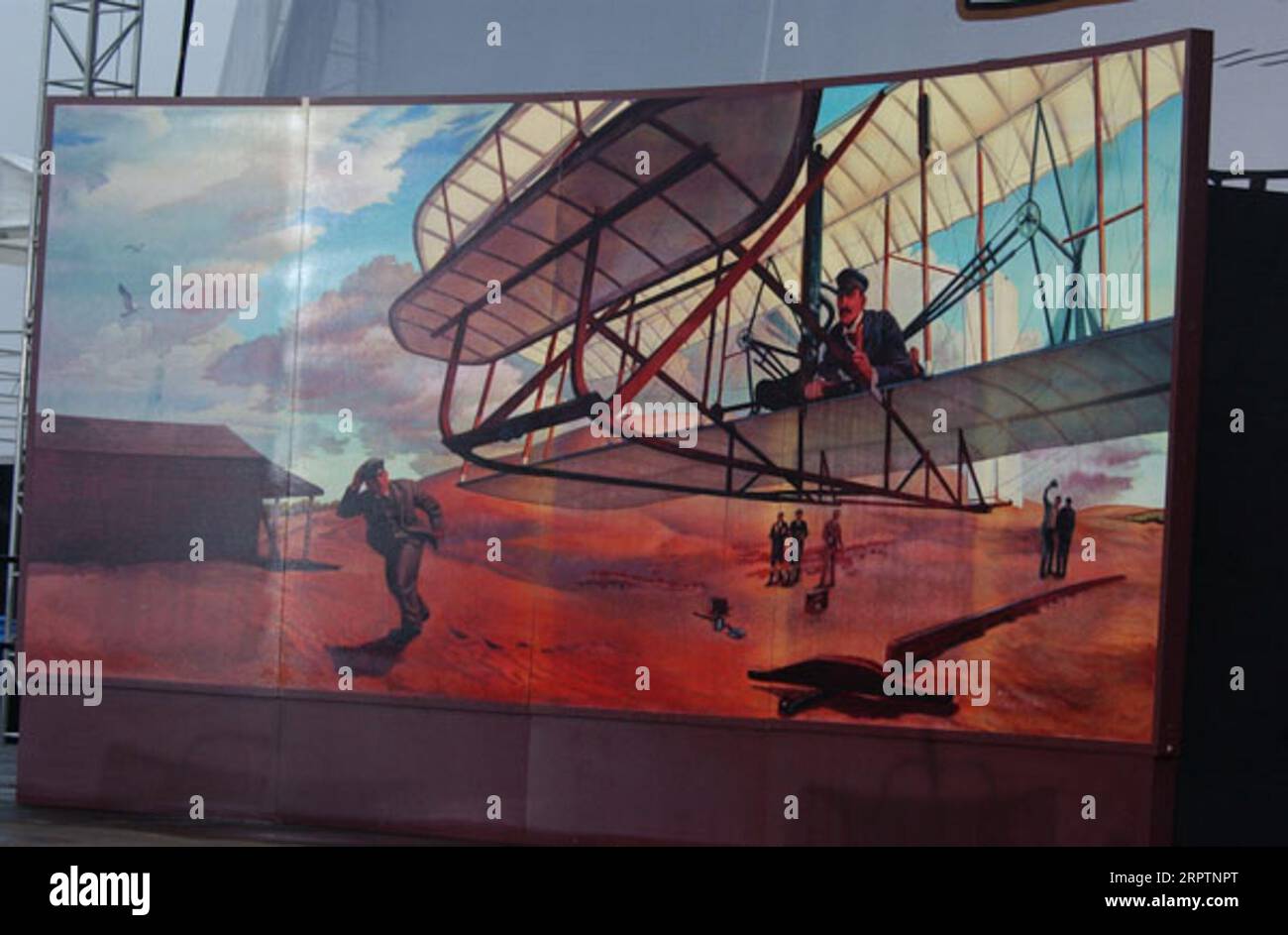 Mural backdrop on stage at ceremonies marking the centennial of the ...