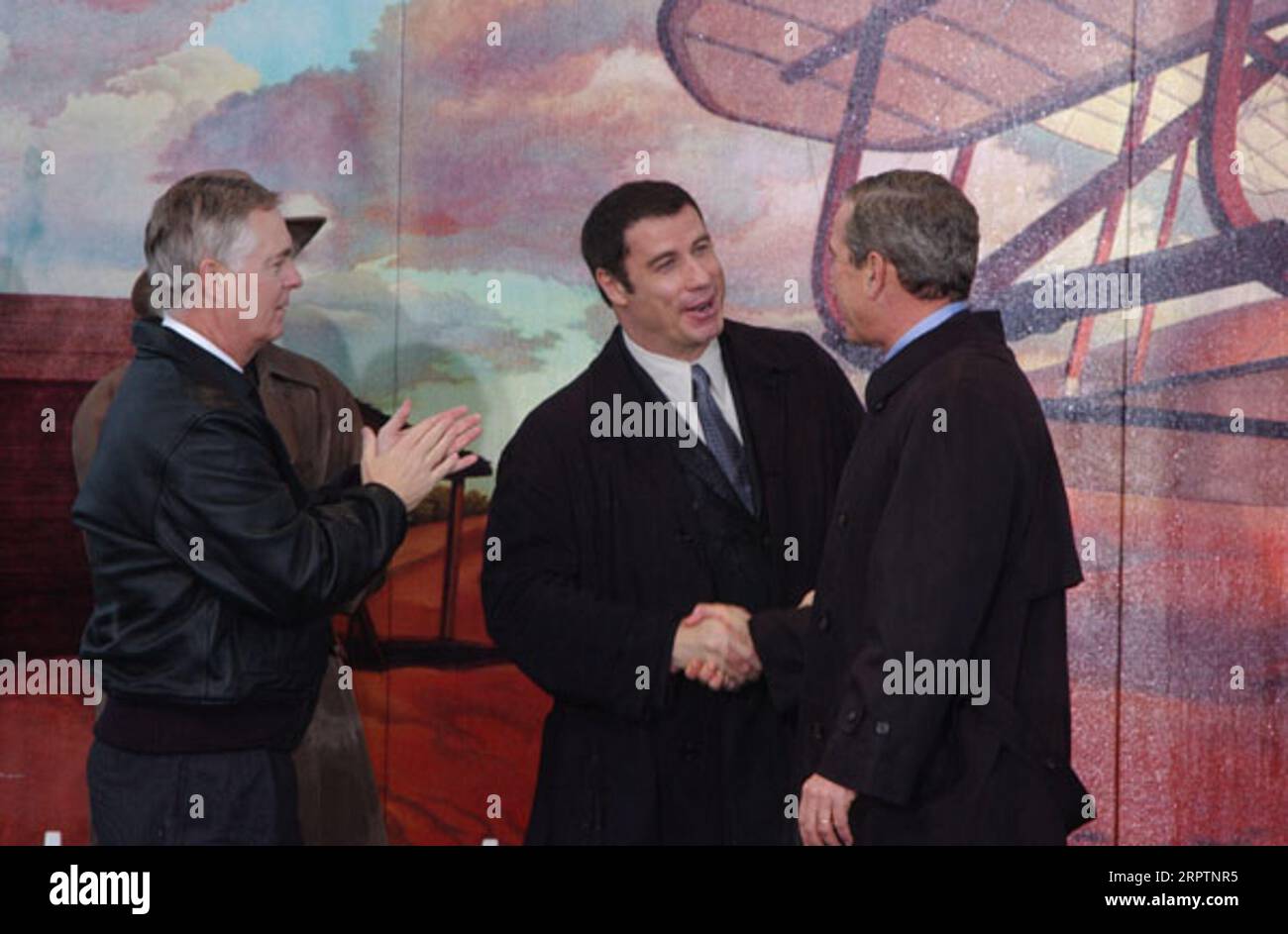 North Carolina Governor Mike Easley, actor John Travolta, and President ...