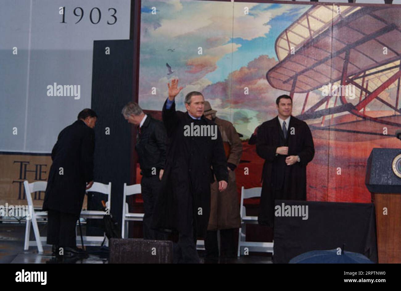 President George Bush waving, with Transportation Secretary Norman ...
