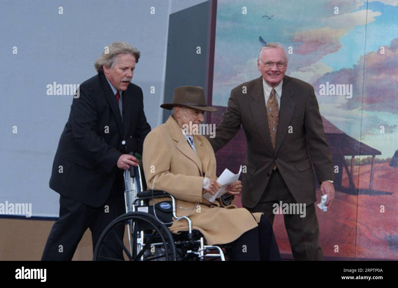First Flight Society President Rex Peters, far left, with Harry Combs ...