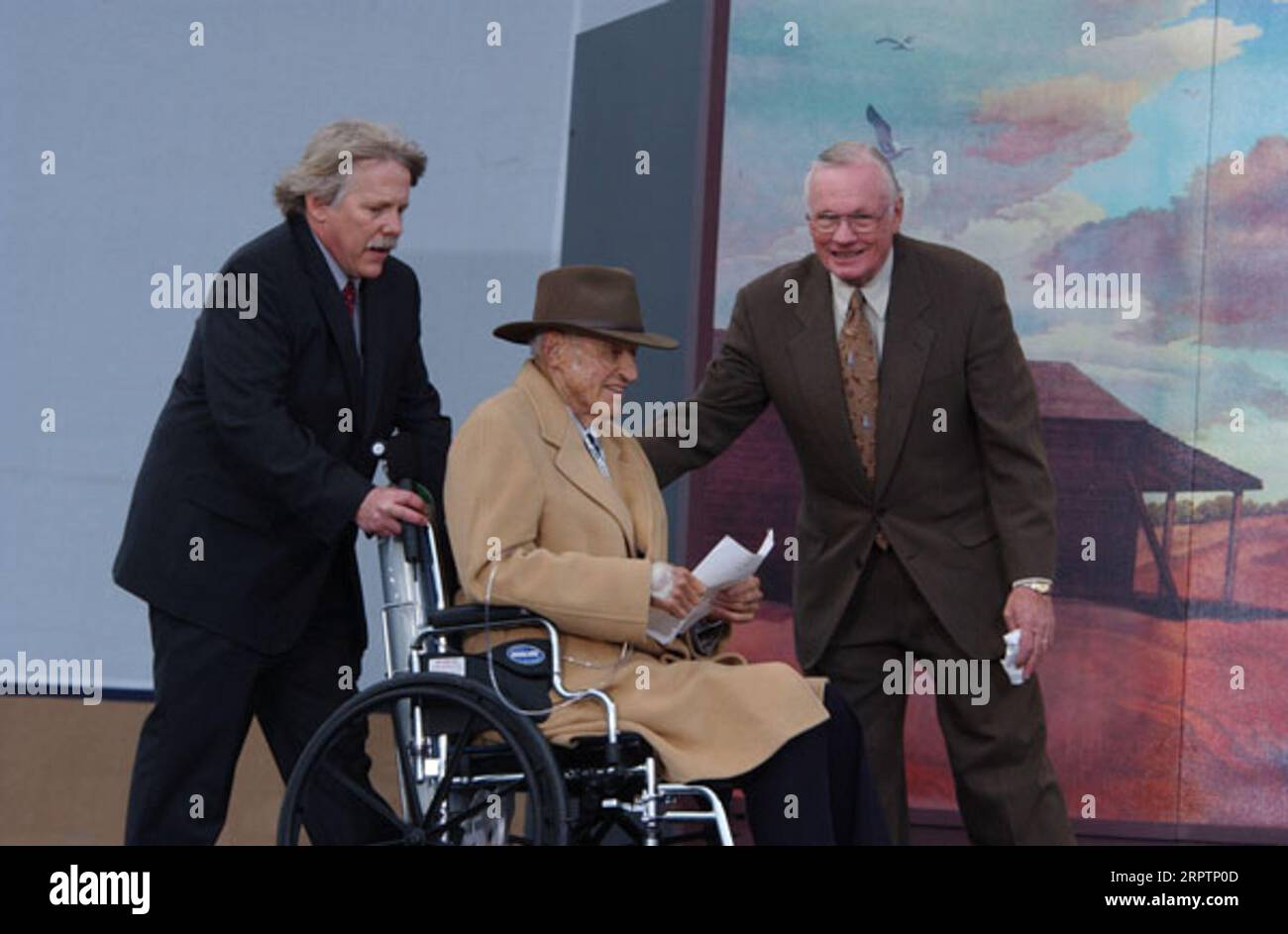 First Flight Society President Rex Peters, far left, with Harry Combs ...