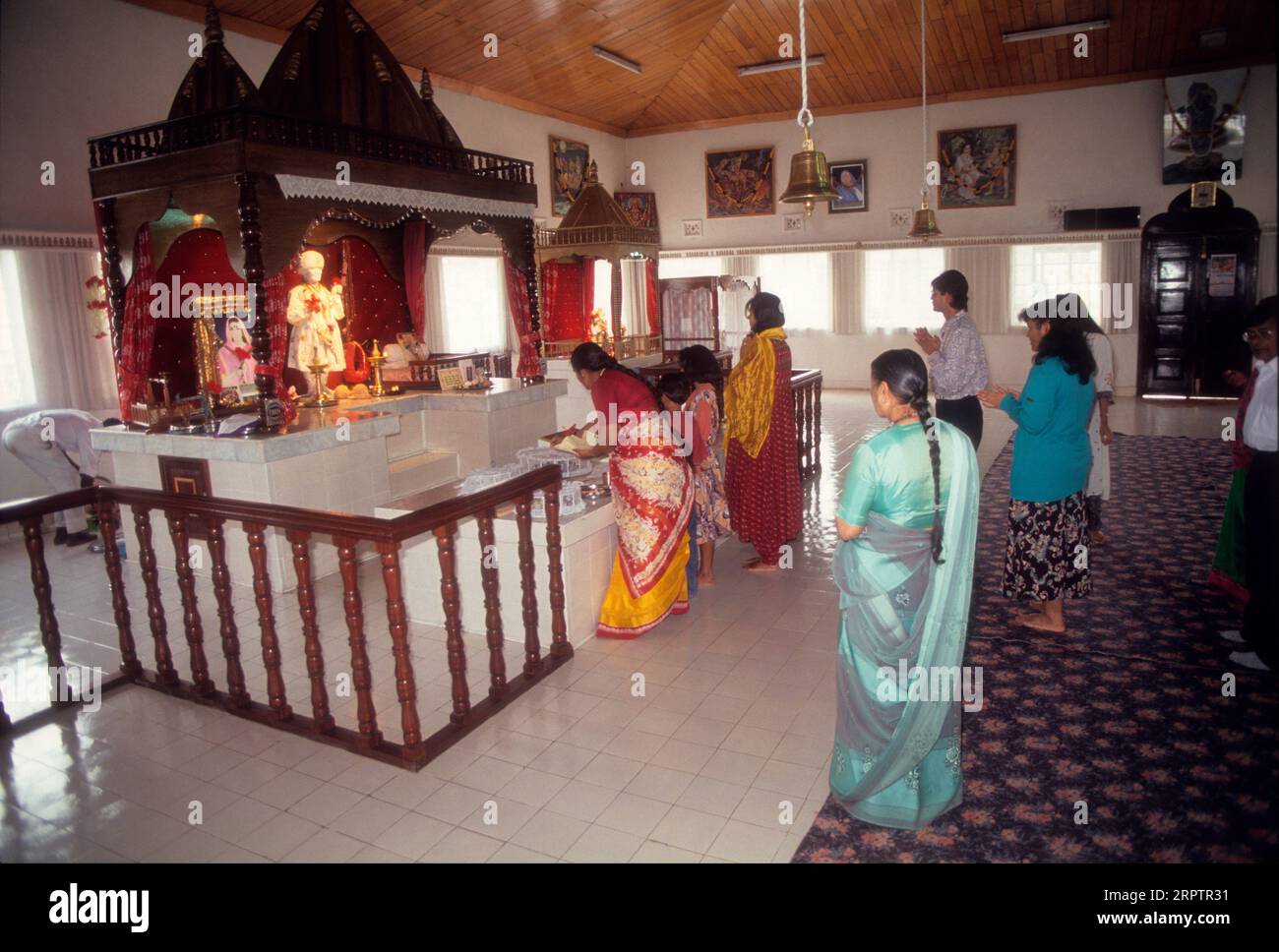 Indian people praying at Shree Jalaram Aradhana Temple, Nakuru, Kenya ...