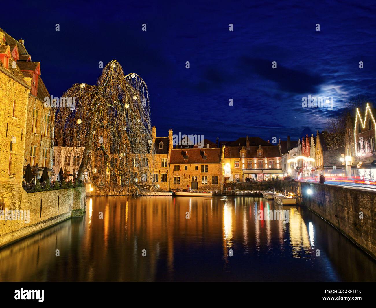 Medieval canal under the moonlight reflection, Bruges, Belgium Stock ...