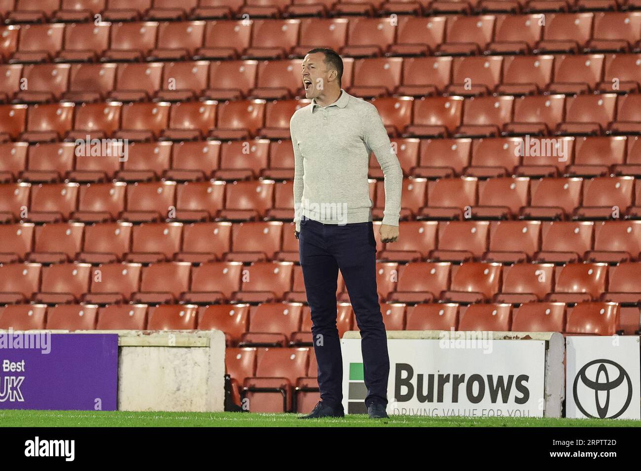 Neill Collins Head coach of Barnsley gives his team instructions during ...
