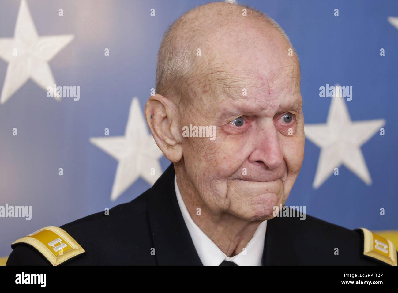 U.S. Army Captain Larry Taylor tears up as President Joe Biden speaks ...