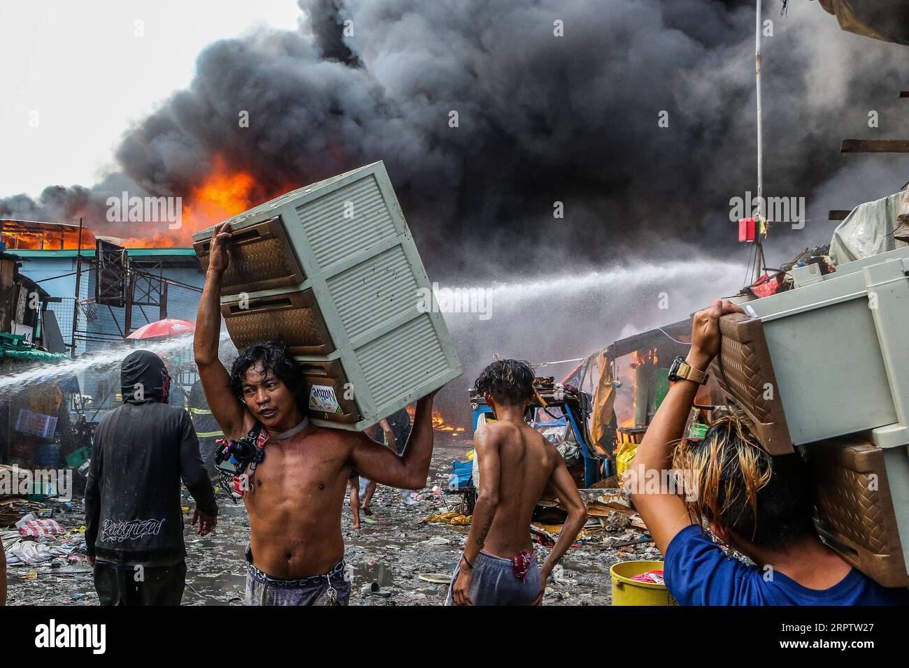Philipines manila slum fire hi-res stock photography and images - Alamy
