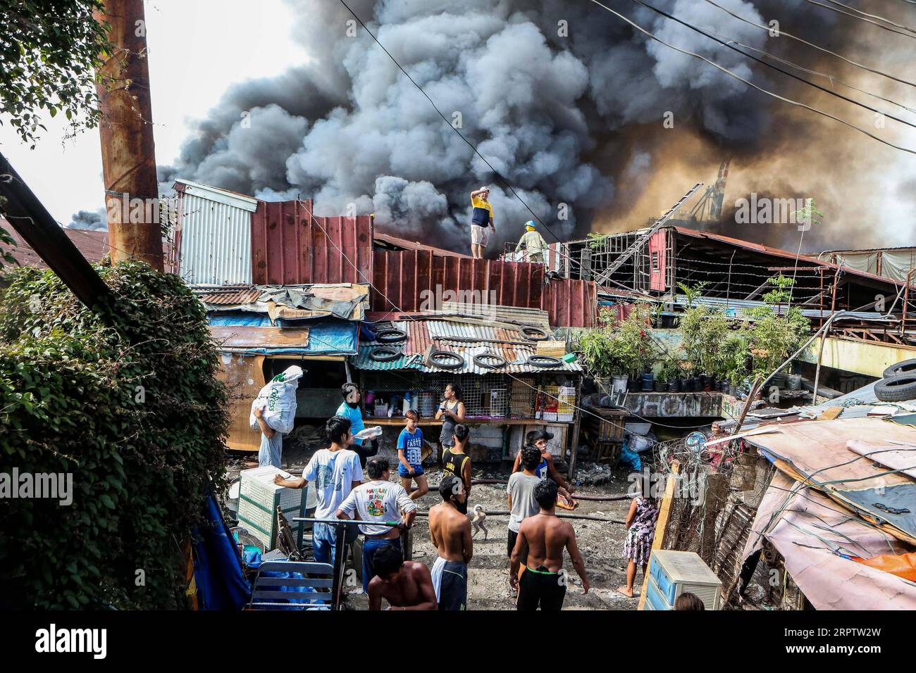 Philipines manila slum fire hi-res stock photography and images - Alamy