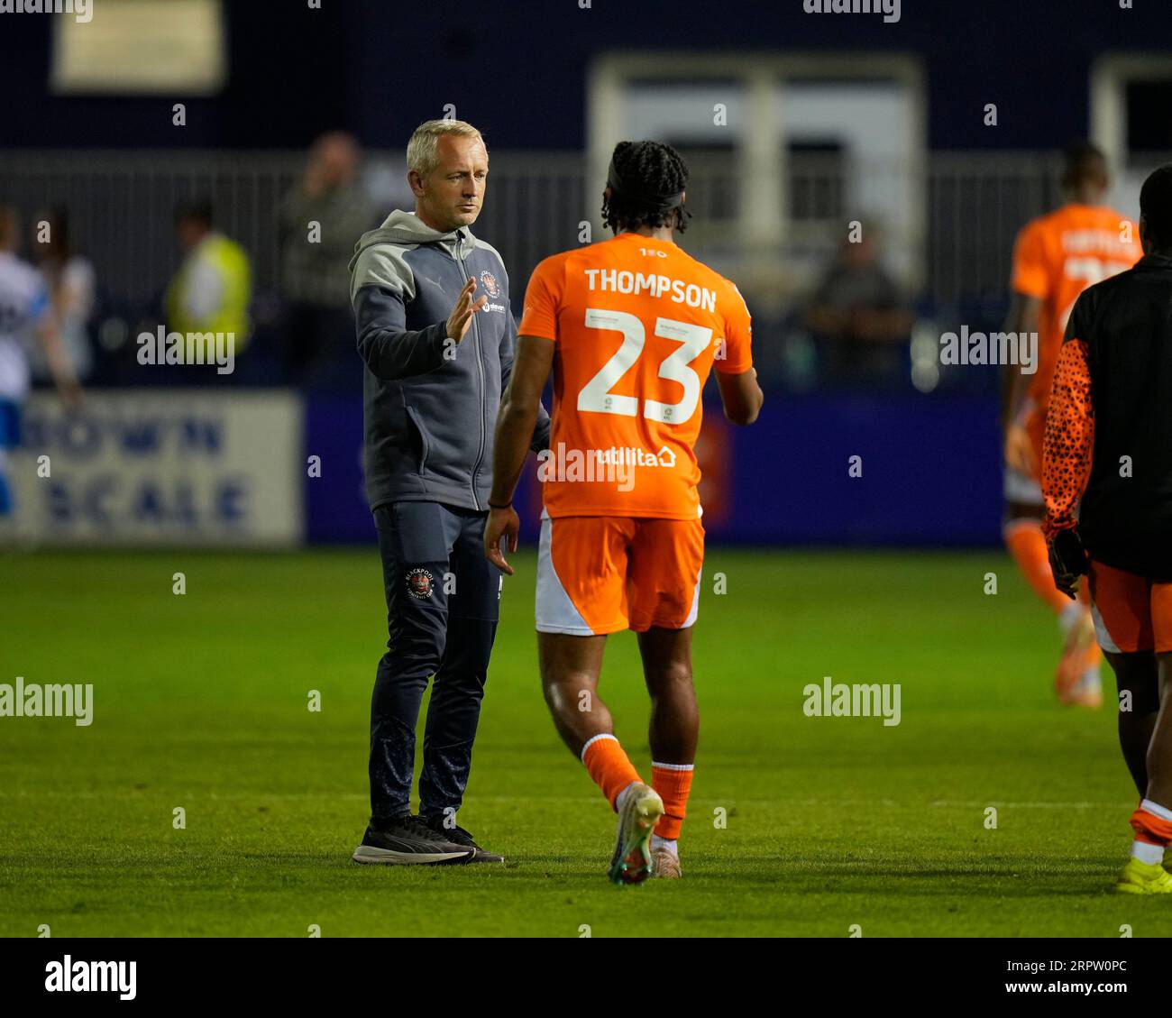 Neil Critchley, Manager of Blackpool high fives Dominic Thompson #23 of ...