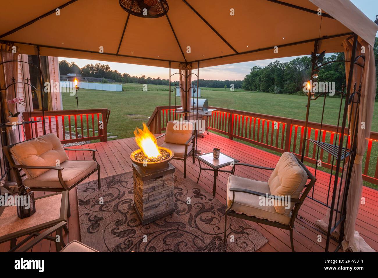 Fire pit on outdoor backyard covered deck, Pennsylvania, USA Stock ...