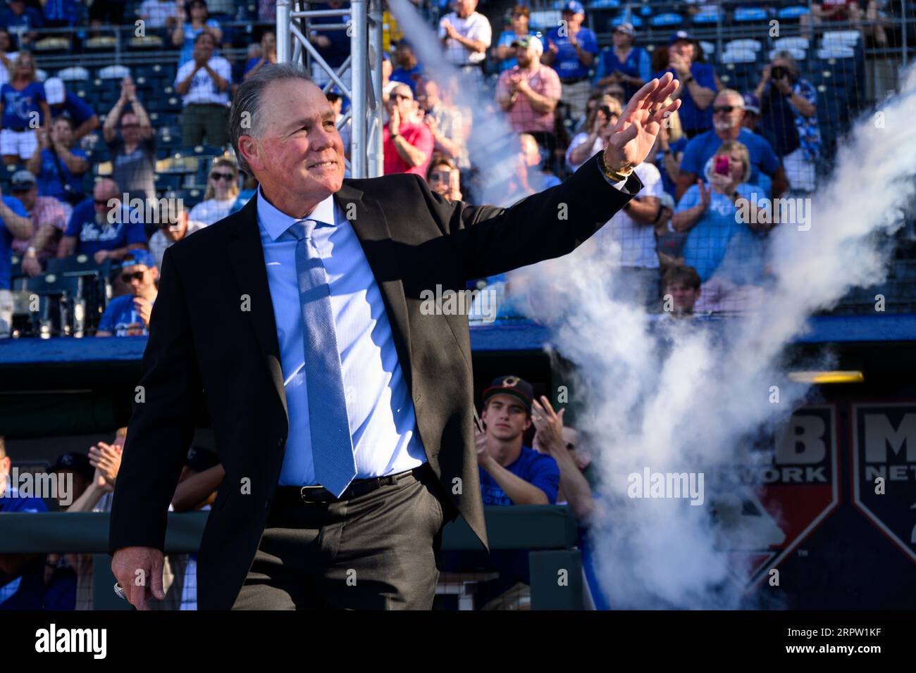 Former Kansas City Royals manager Ned Yost comes onto the field for his ...