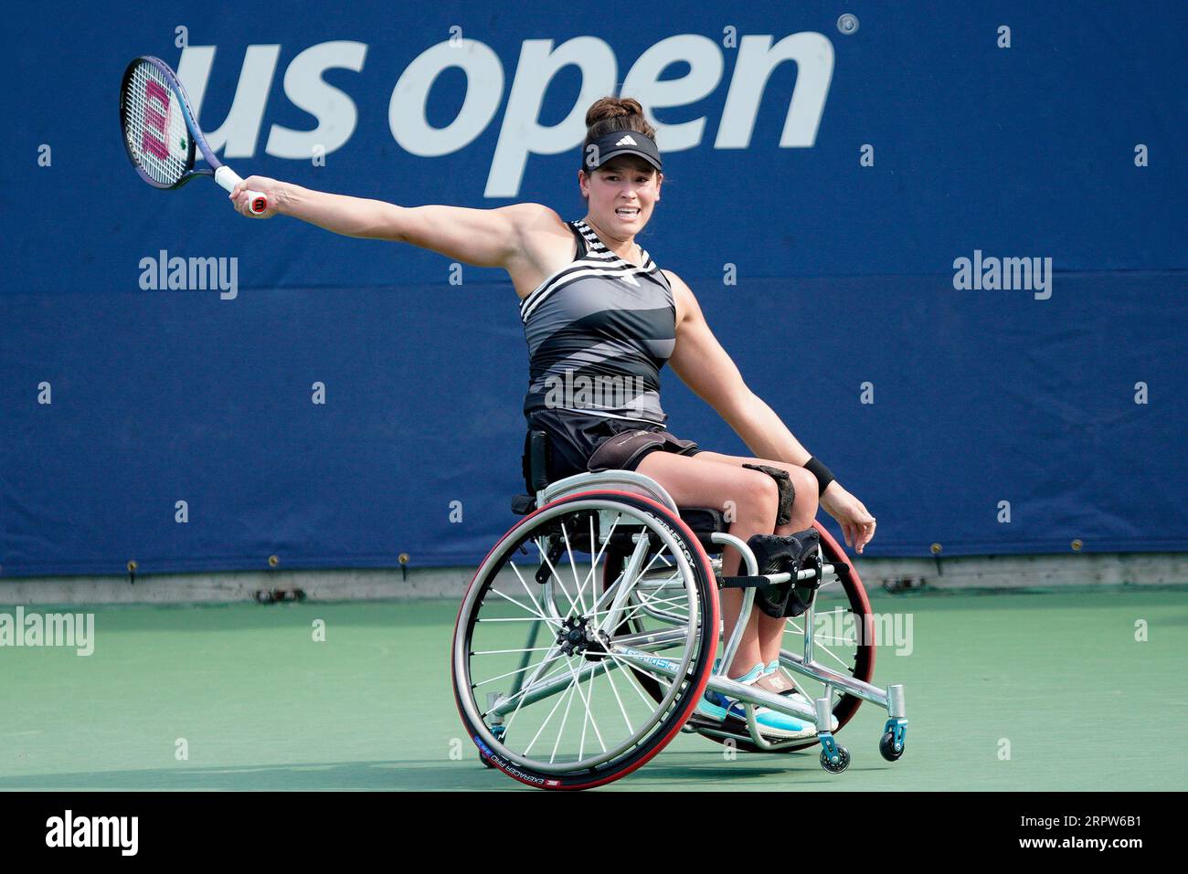 Dana Mathewson, of the United States, returns a shot to Yui Kamiji, of ...