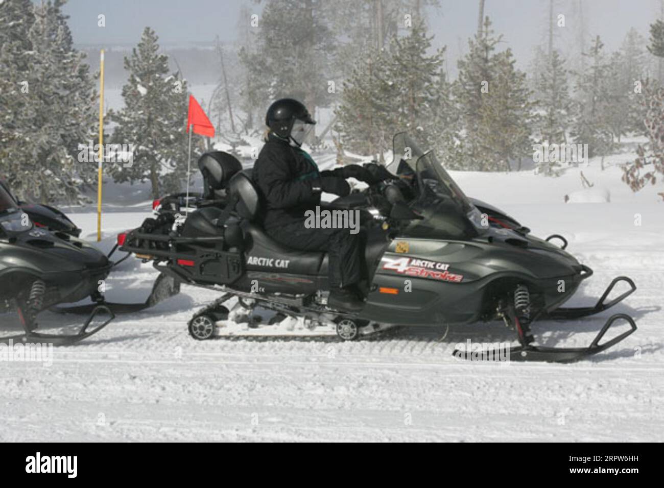Secretary Gale Norton riding snowmobile on visit to Yellowstone ...