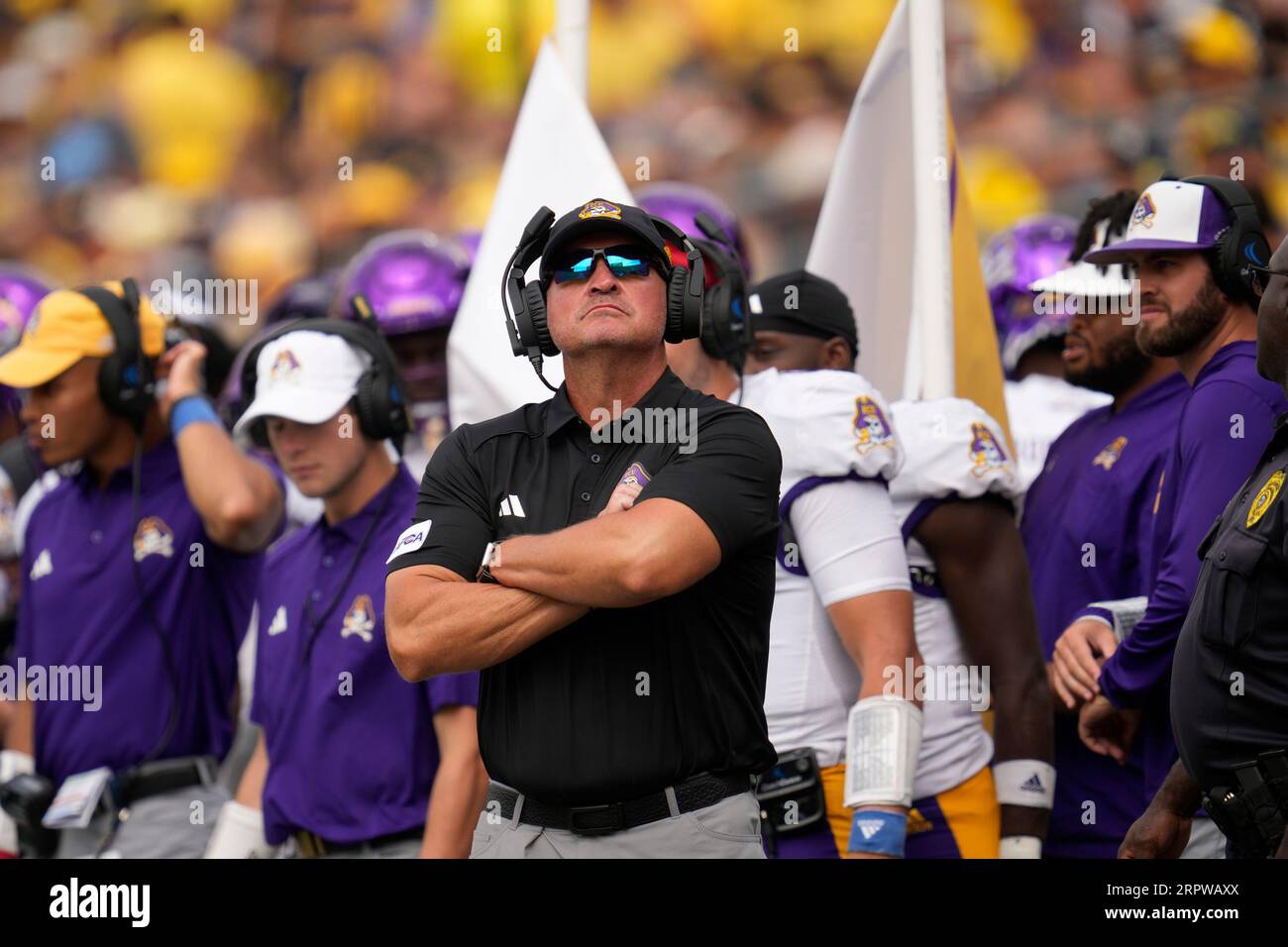 East Carolina head coach Mike Houston watches against Michigan in the ...