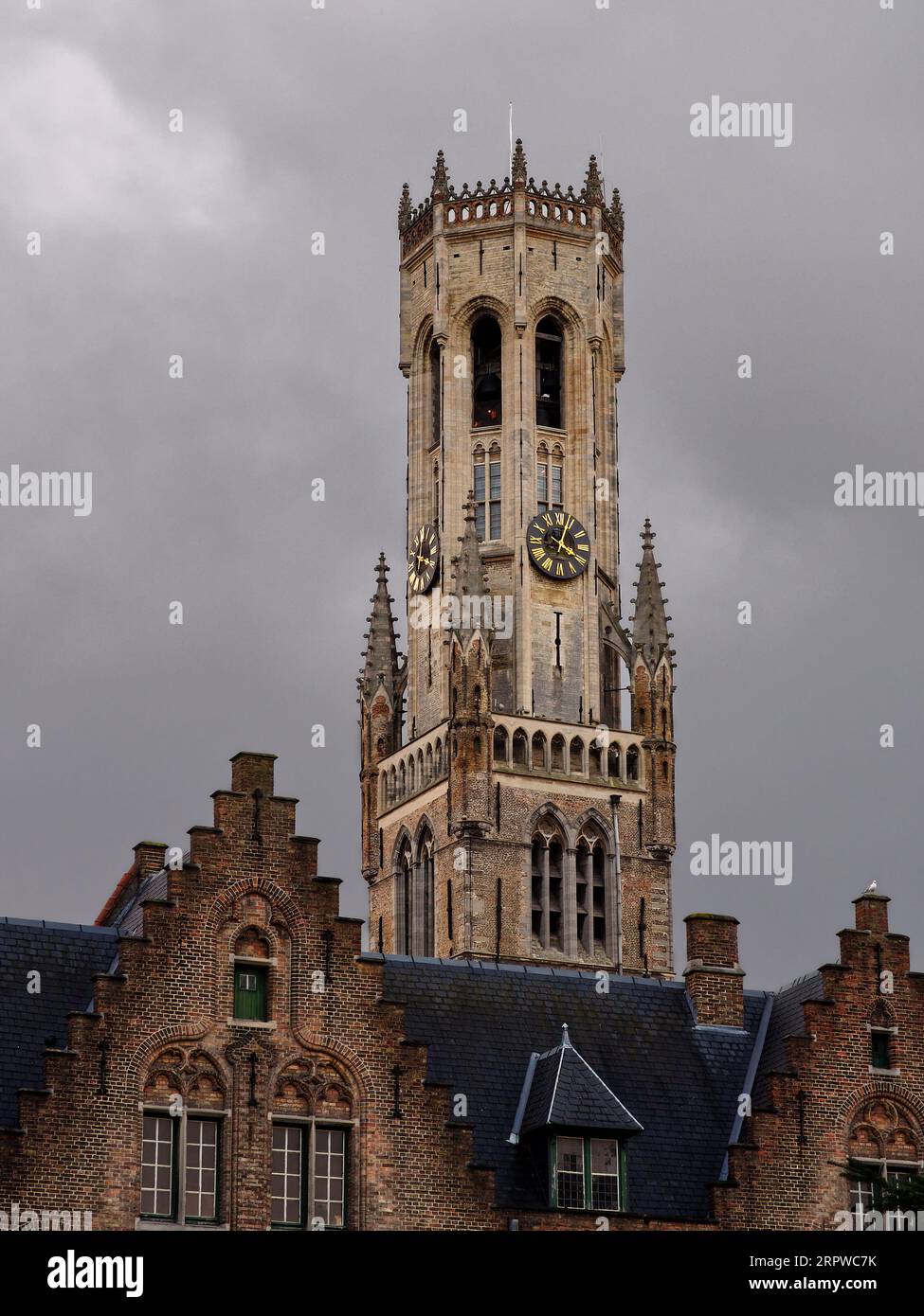Famous Belfry Tower under dramatic sky, Bruges, Belgium Stock Photo - Alamy