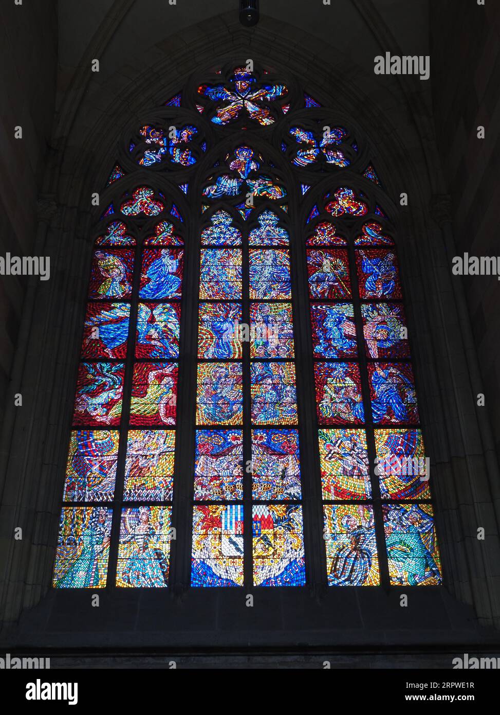 A stained glass window of the cathedral of saint vitus, prague, czech ...