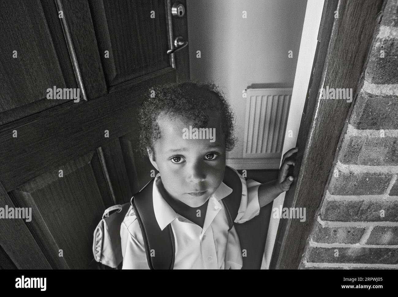 Ready for school in her uniform and back satchel hi-res stock photography and images - Alamy