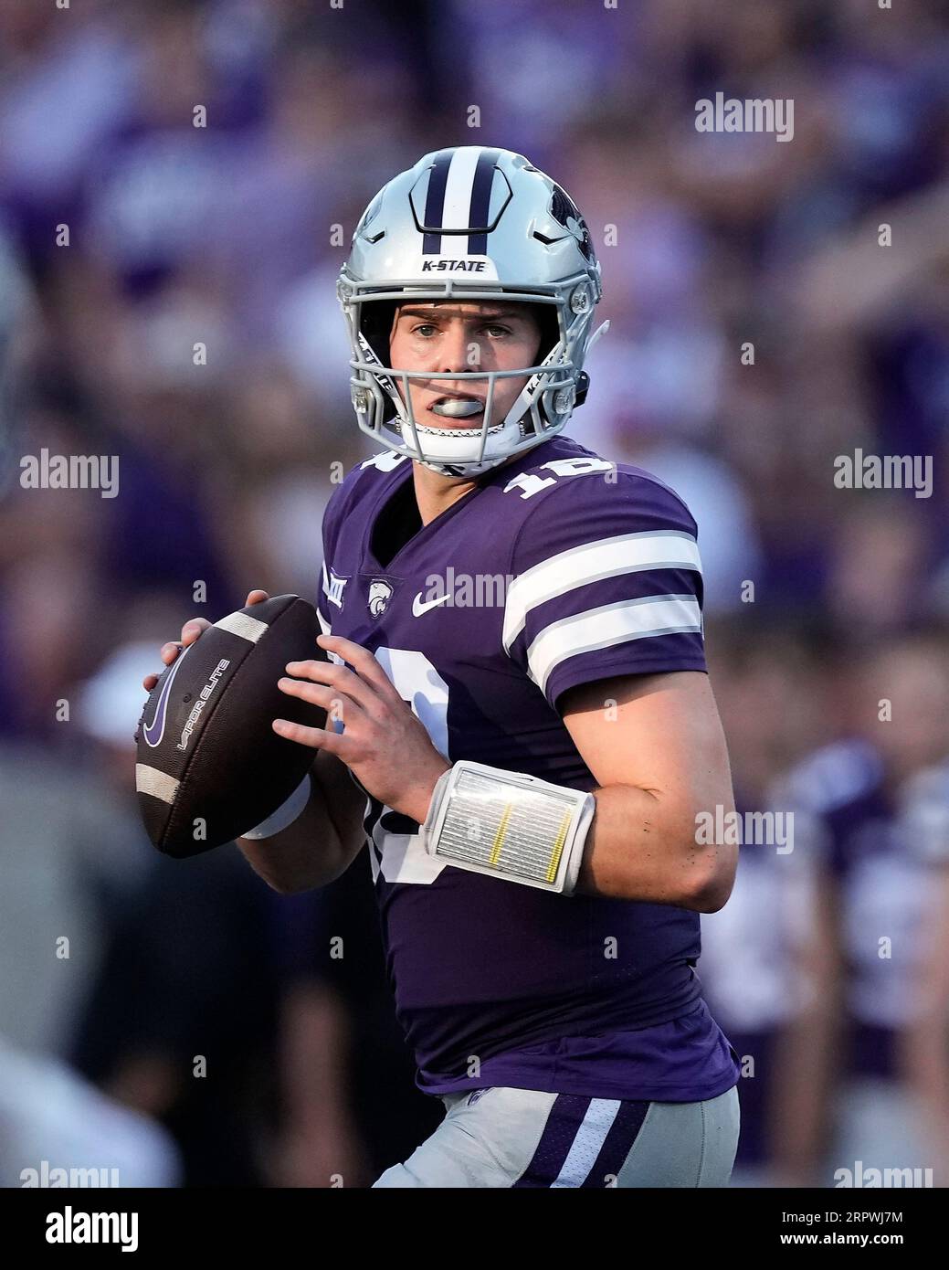 Kansas State quarterback Will Howard throws during the first half of an ...