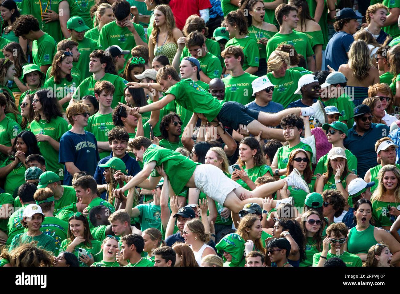 Notre Dame fans do pushups after a touchdown during the first half of ...