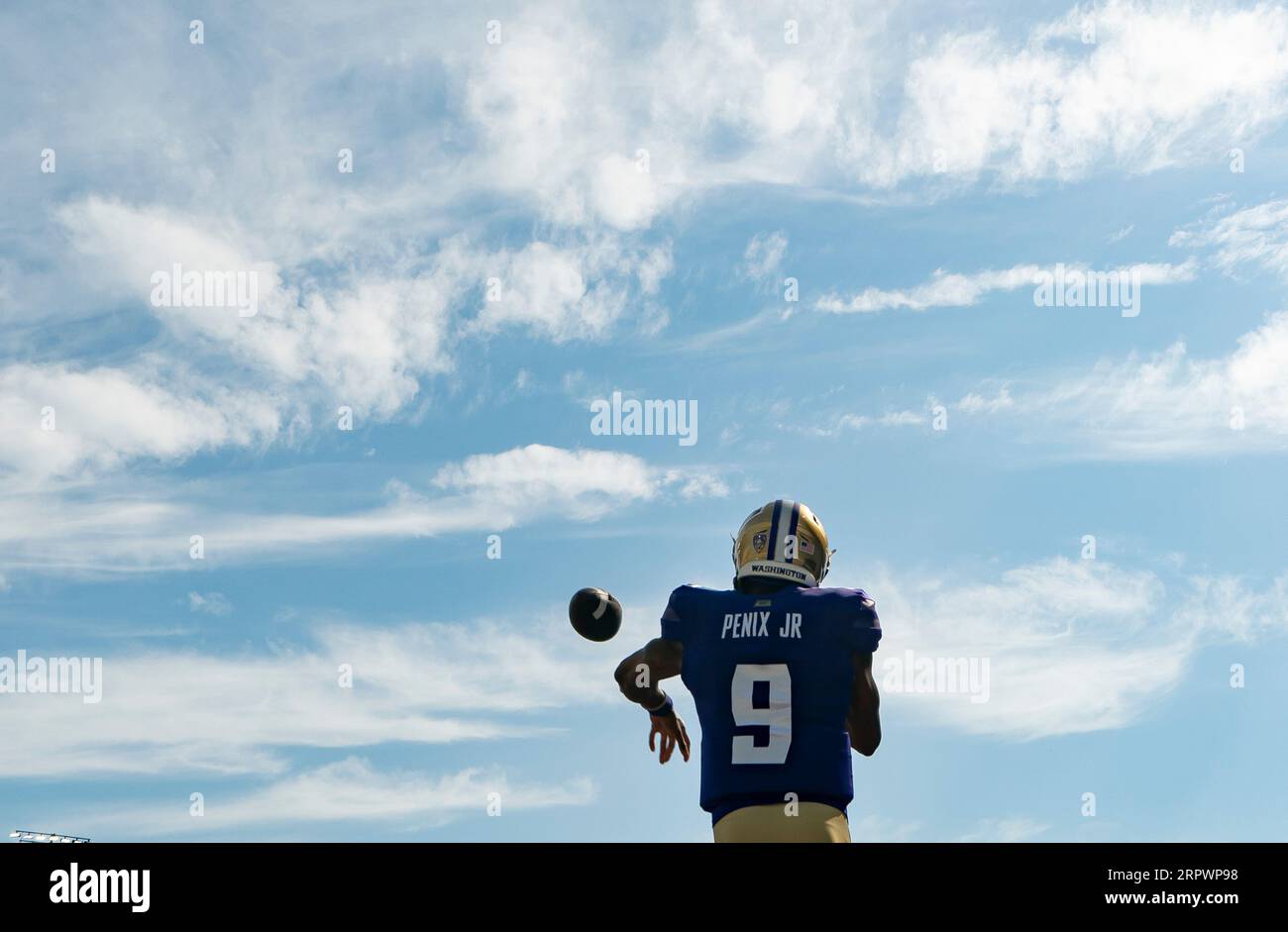 Washington quarterback Michael Penix Jr. warms up before an NCAA college football game against ...