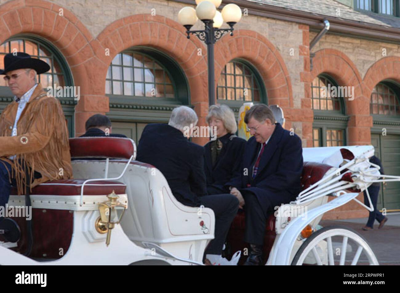 Secretary Gale Norton joining Wyoming Governor Dave Freudenthal, seated ...