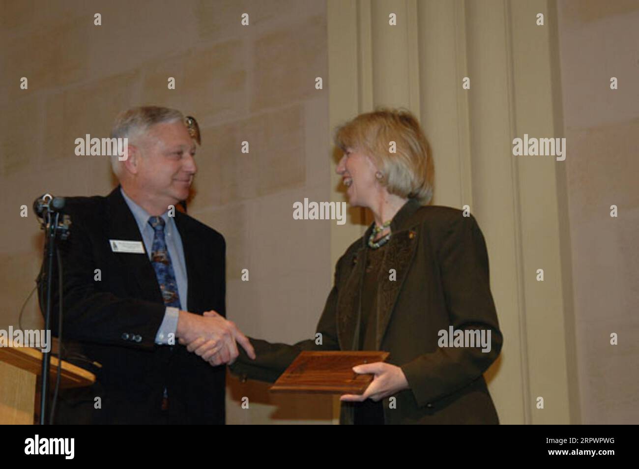 Secretary Gale Norton, right, with the Chief Executive Officer of the ...