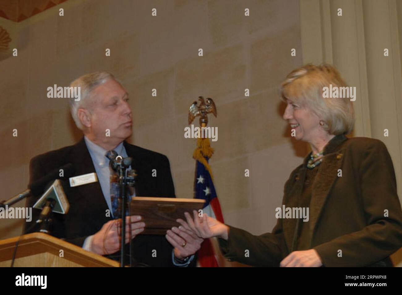 Secretary Gale Norton, right, with the Chief Executive Officer of the ...