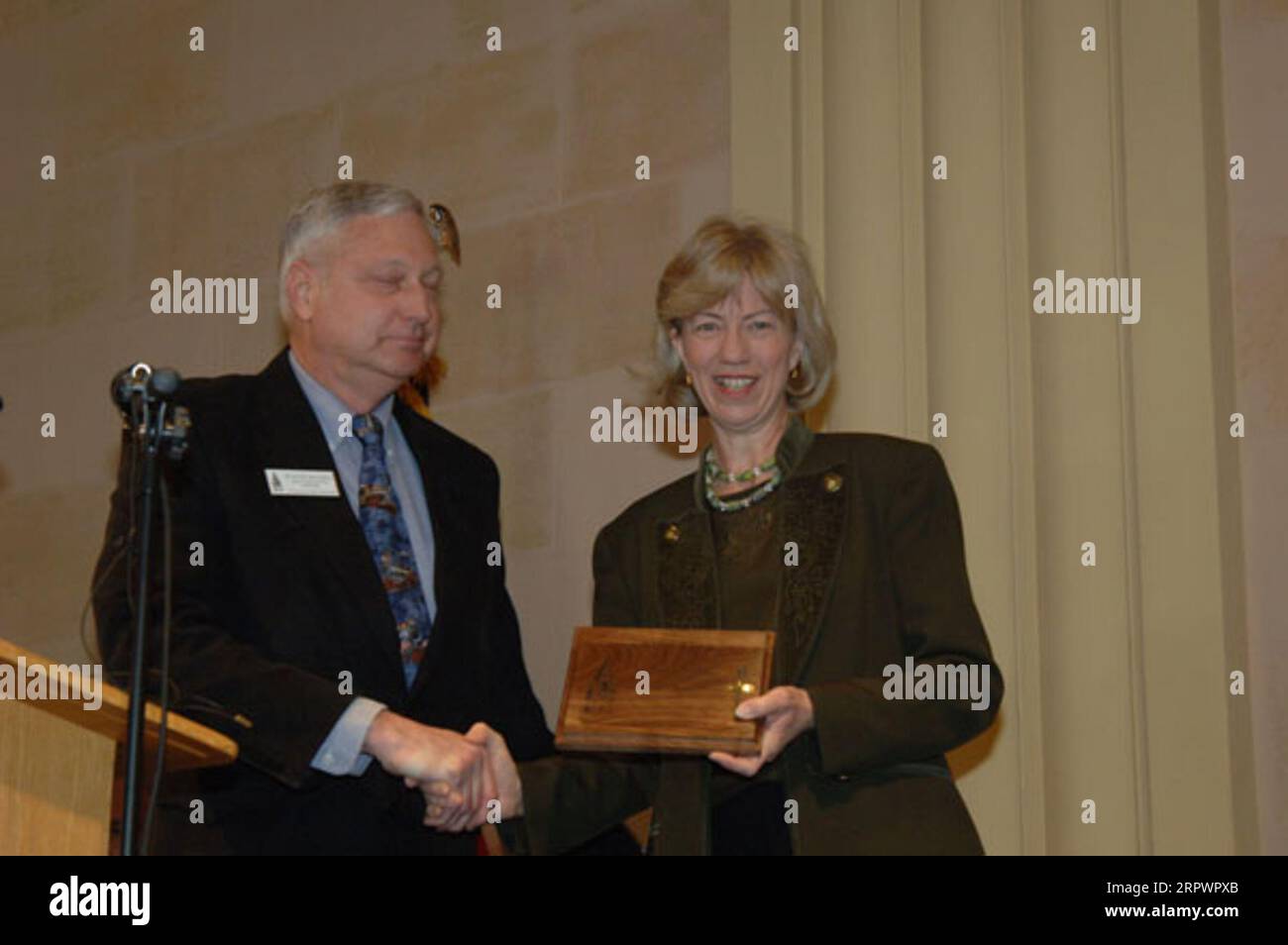 Secretary Gale Norton, right, with the Chief Executive Officer of the ...