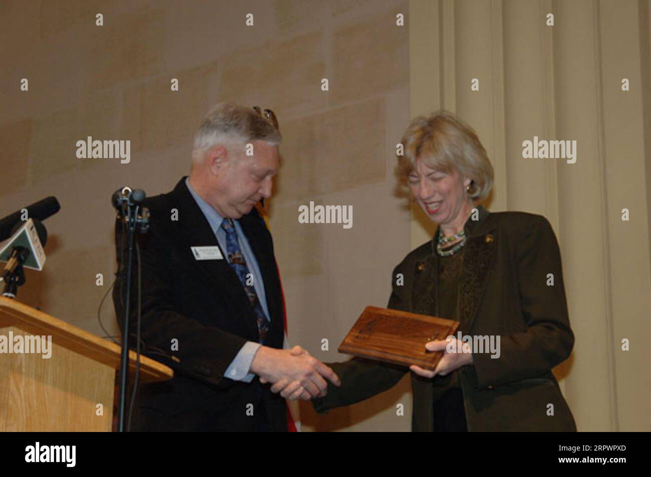 Secretary Gale Norton, right, with the Chief Executive Officer of the ...