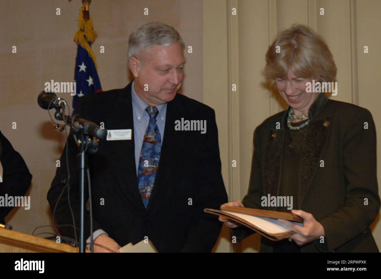 Secretary Gale Norton, right, with the Chief Executive Officer of the ...