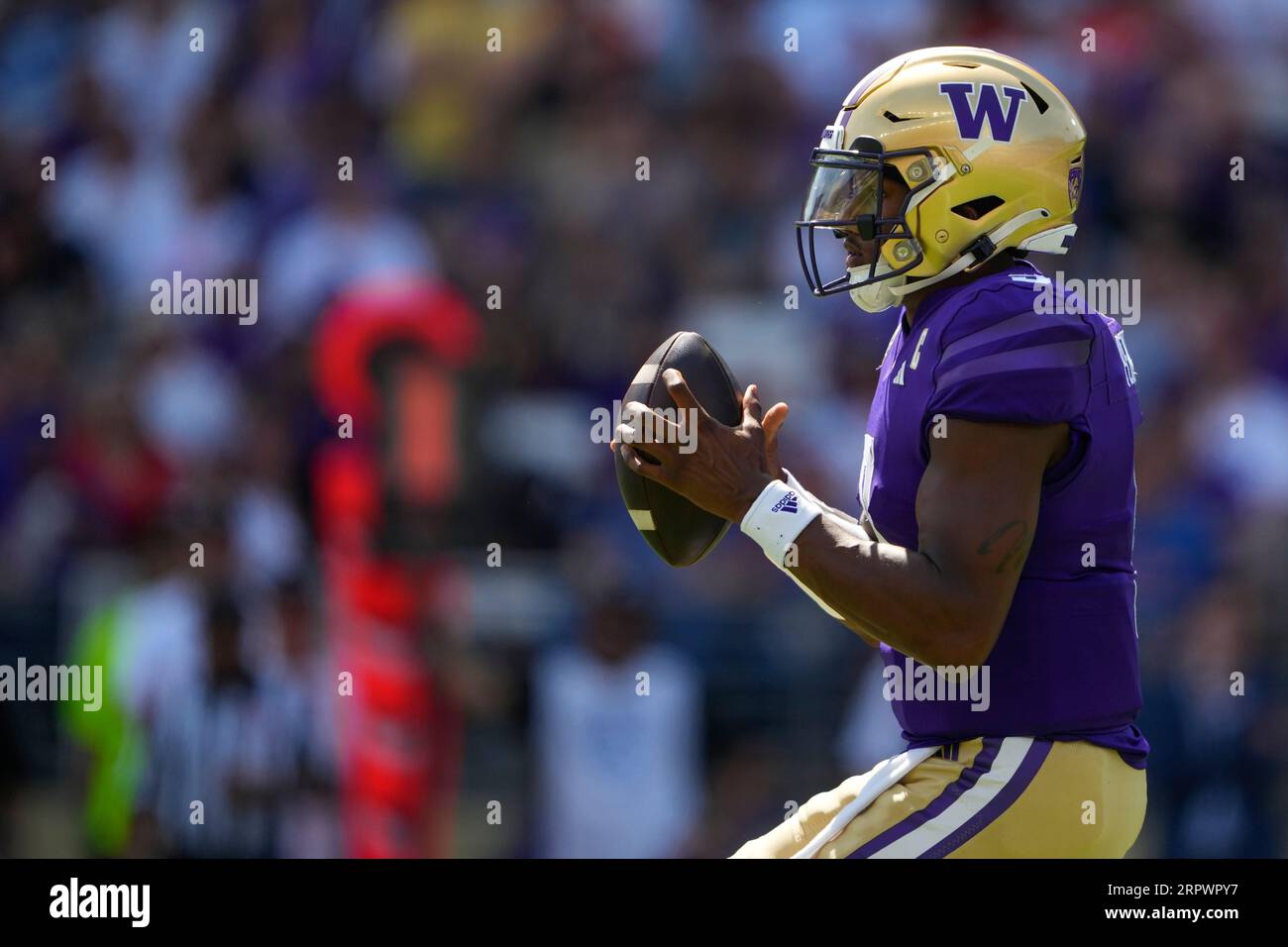 Washington quarterback Michael Penix Jr. looks to throw against Boise State during the first ...