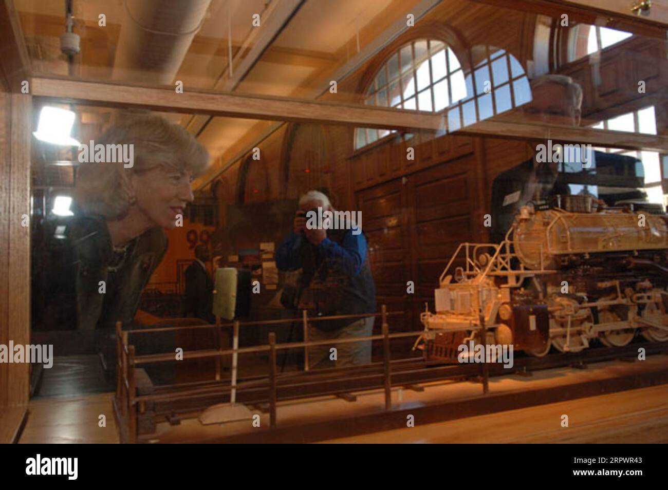 Secretary Gale Norton, left, accompanied by the Chief Executive Officer ...