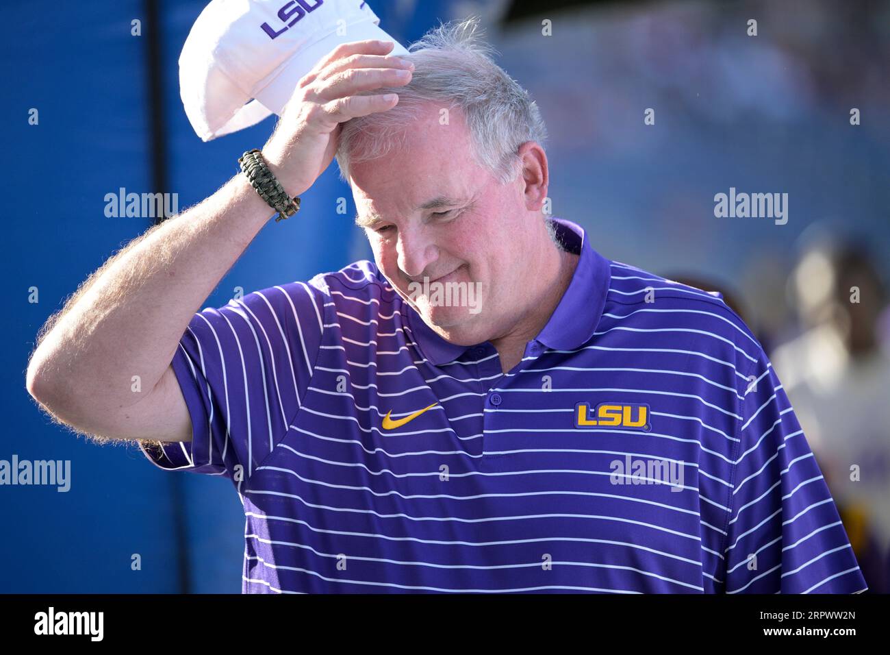LSU senior offensive analyst Terry Malone walks off of the field before ...