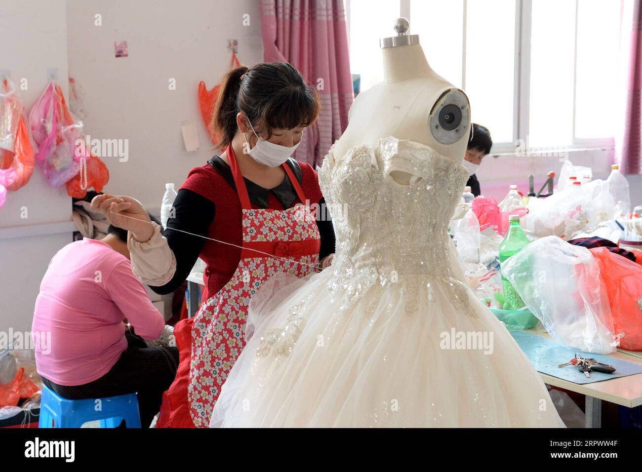 Dress industry hi-res stock photography and images - Alamy