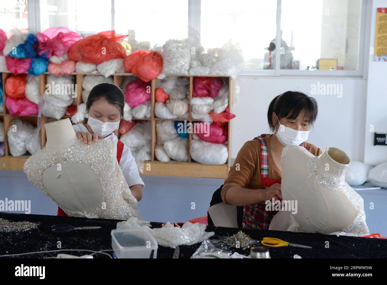 Dress industry hi-res stock photography and images - Alamy