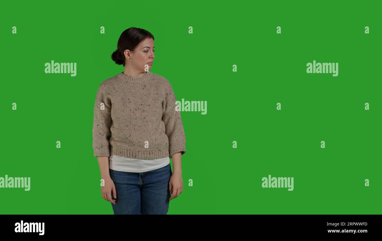 Front view of person showing refusal and pushing thing aside ...