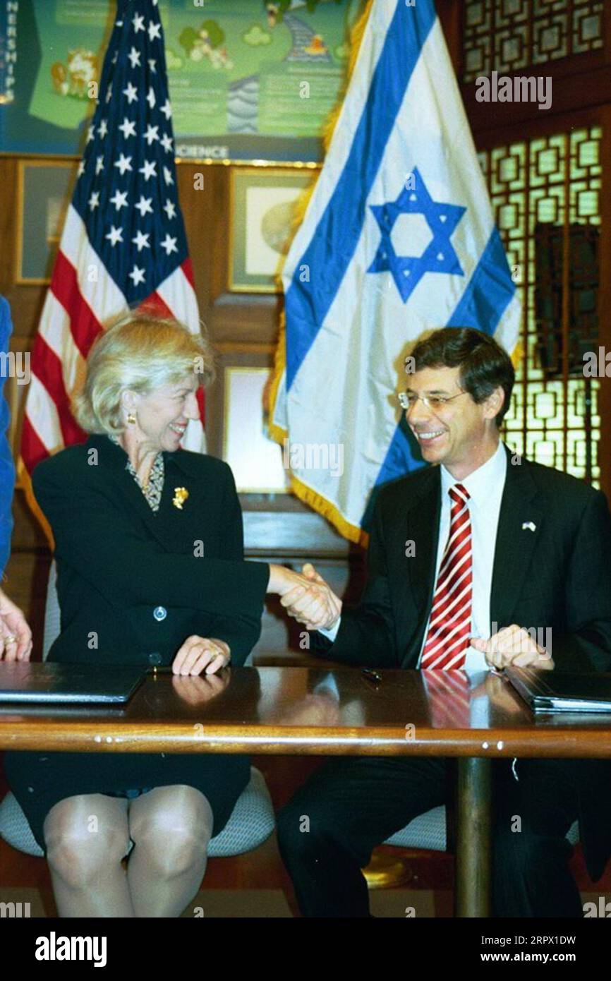 Secretary Gale Norton, left, shaking hands with Israel's Ambassador to ...